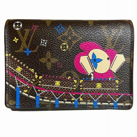 Louis Vuitton | Bags | Pre Loved Louis Vuitton Elephant Print Wallet ...